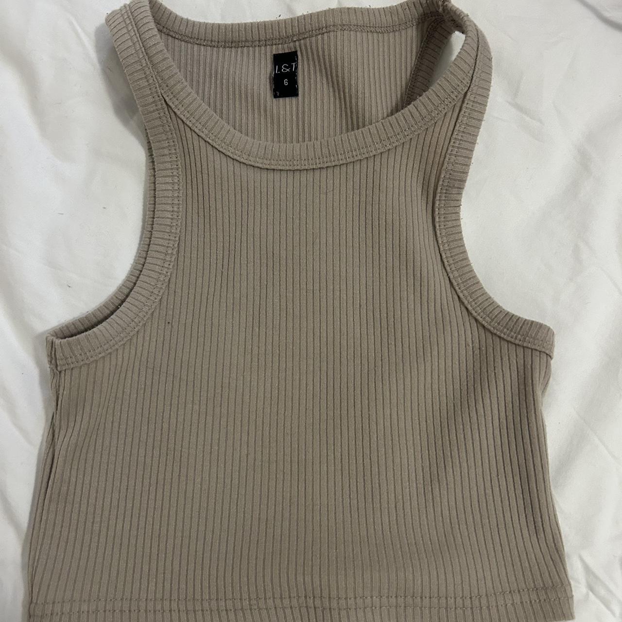 Purple/cream tanks. $20 each. Both size 6. Hardly worn - Depop