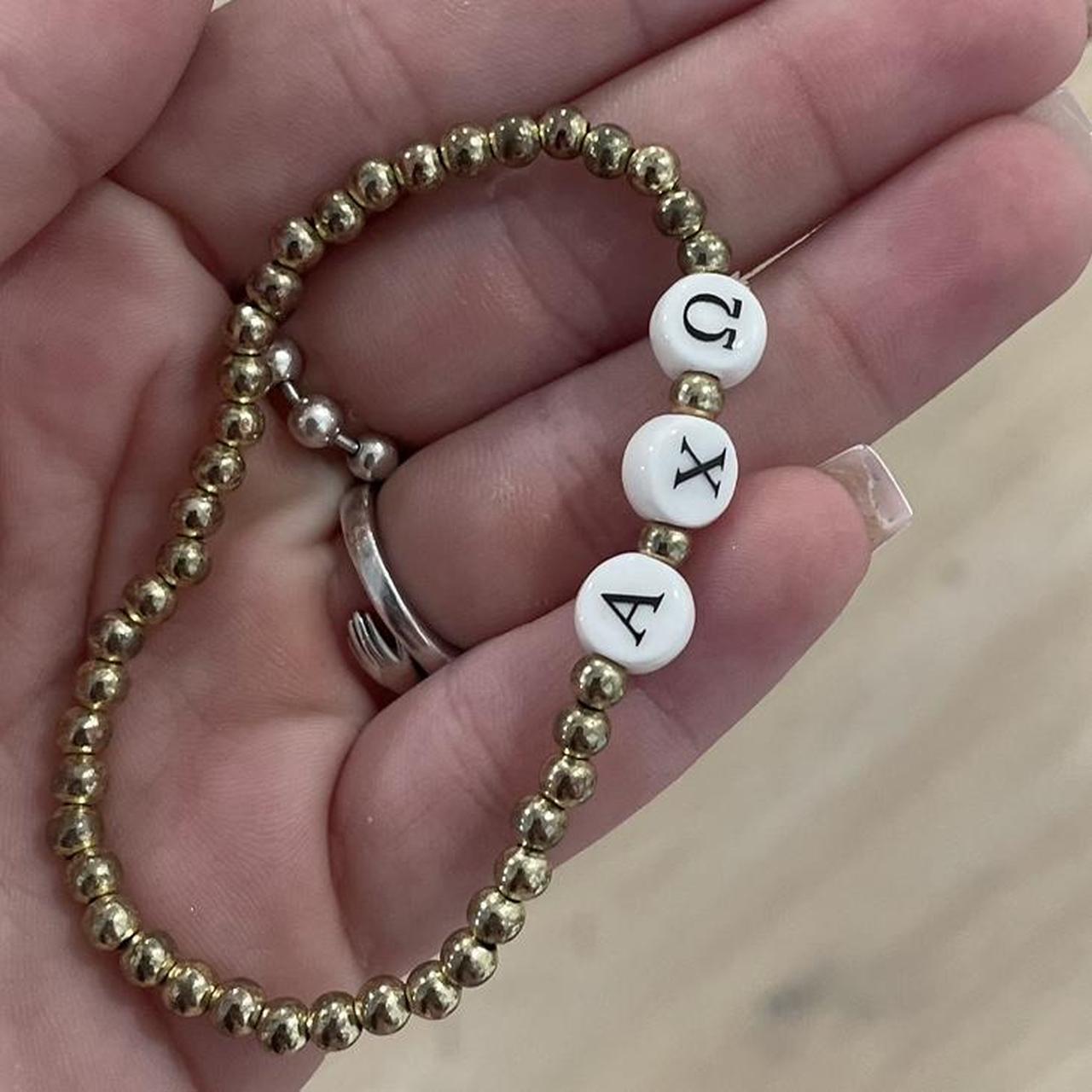 Axo alpha chi omega bracelet Brand new never... - Depop