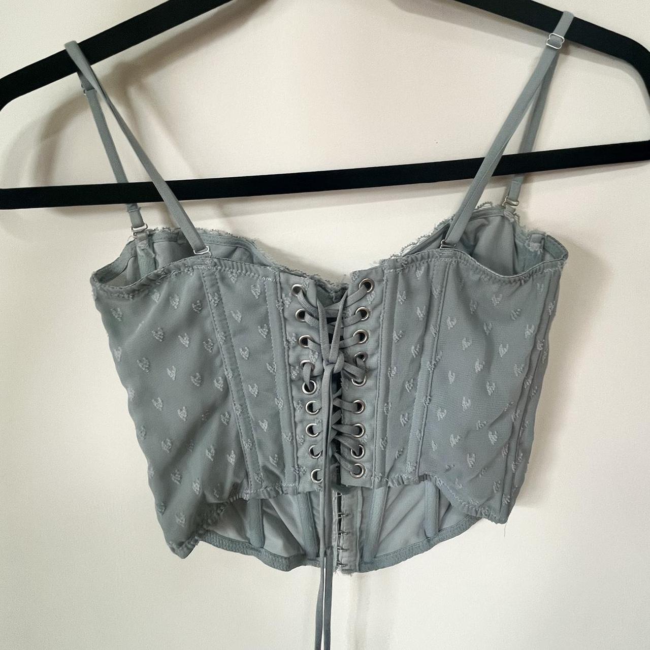 light blue corset top - urban outfitters with small... - Depop
