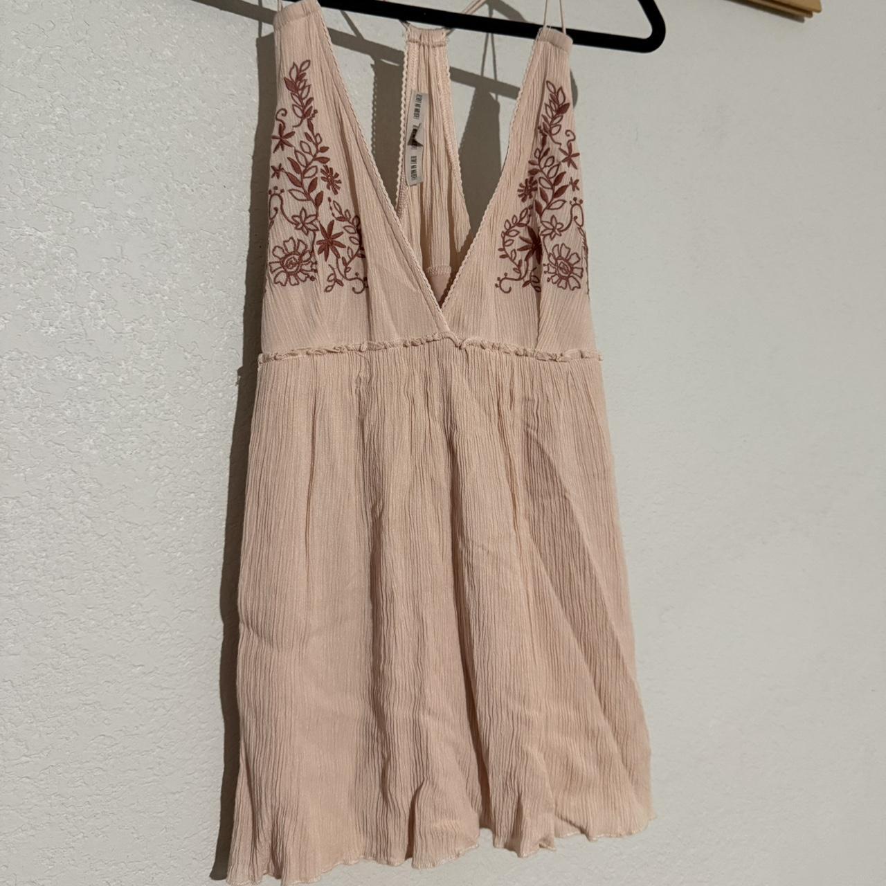 Soft pink top with embroidered floral detailing... | Depop