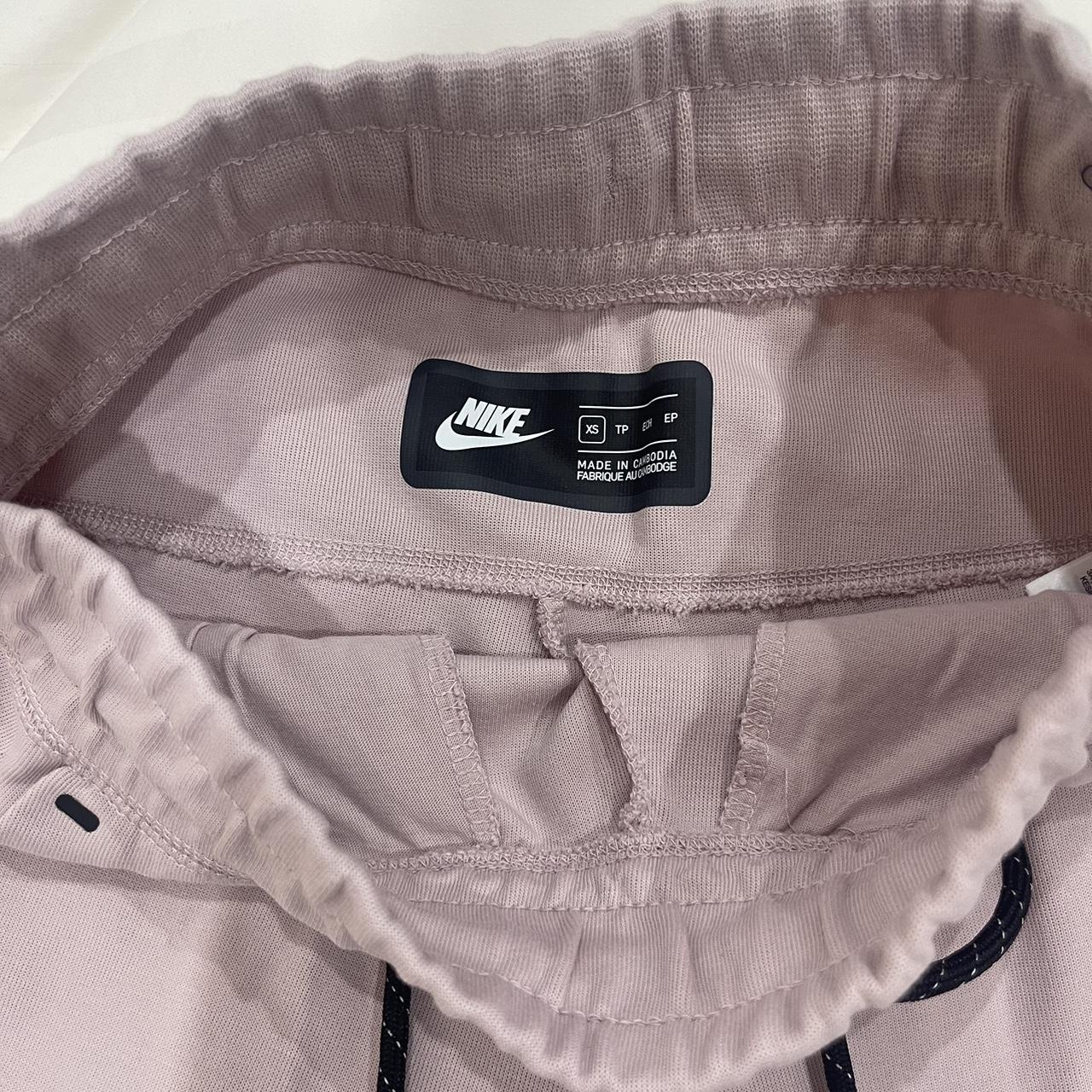 Nike tech fleece trackies Colour- dusty pink - Depop