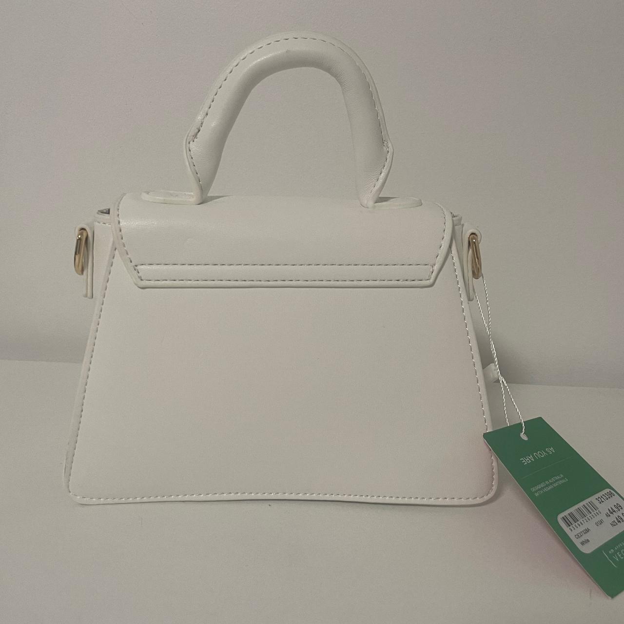 Aya small white handbag, never used. some marks due... - Depop