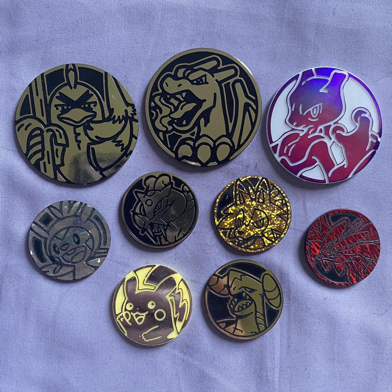 lot of official pokémon flip coins includes... - Depop