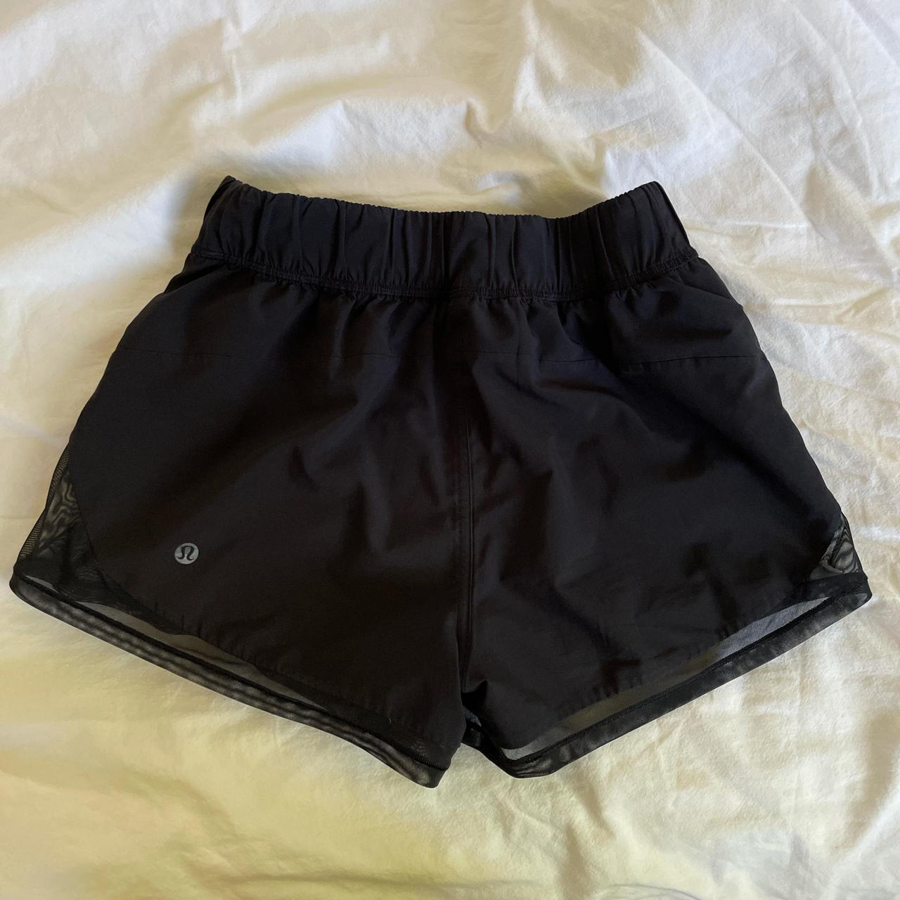 Lululemon Black Shorts rip in mesh size 2 tags cut... - Depop