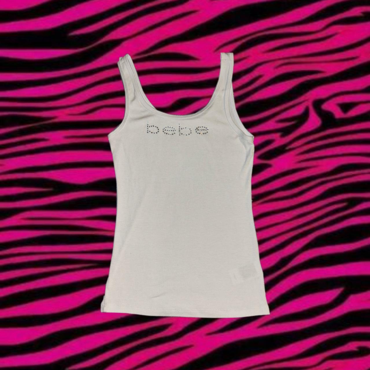 white bebe jeweled top. size medium but fits me as a... - Depop