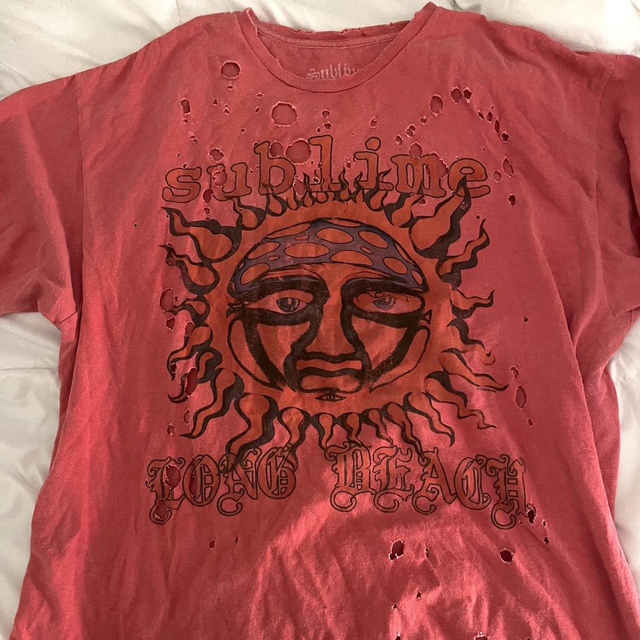 pink sublime ripped t-shirt size fits as XL - Depop