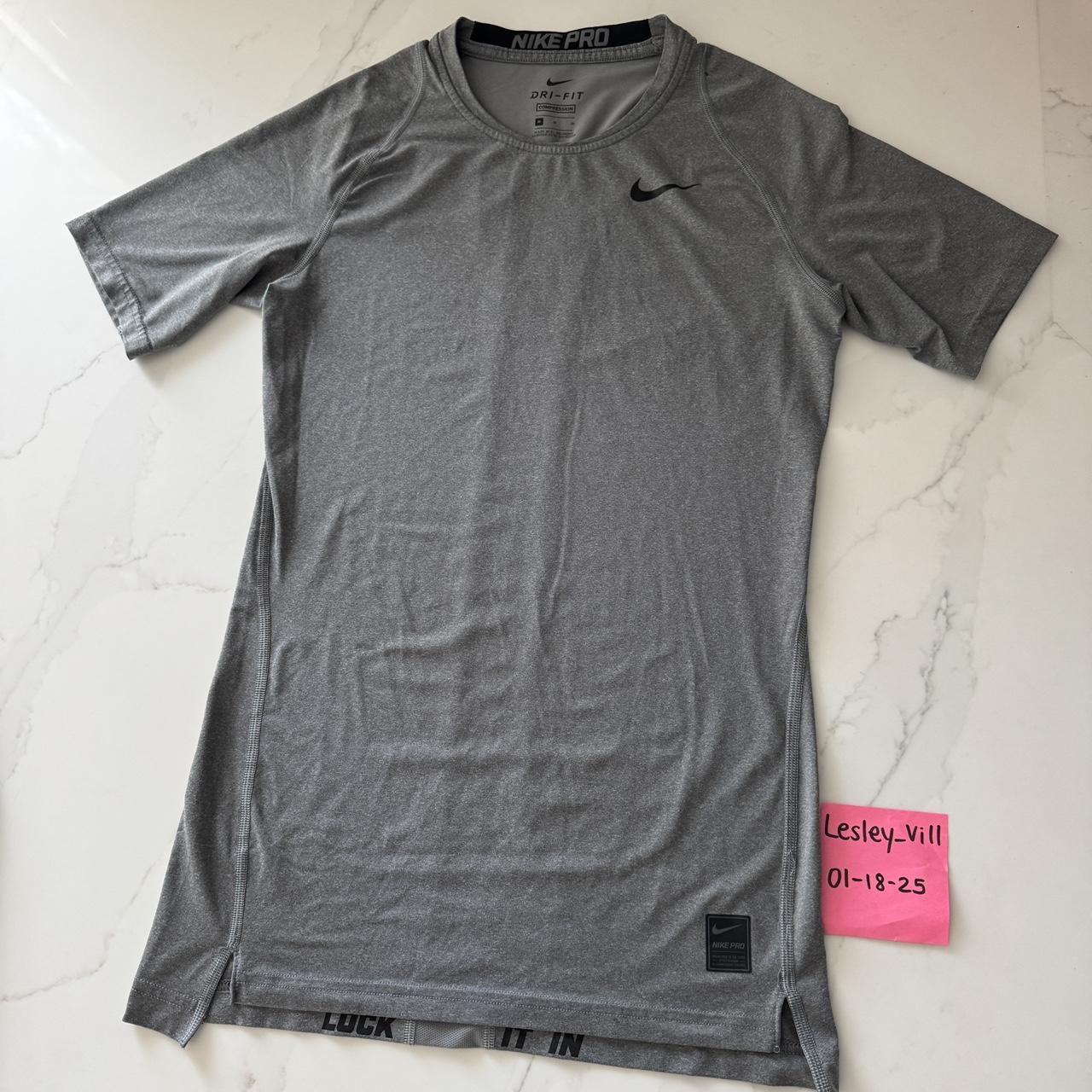Grey Nike Pro Dri-Fit compression t-shirt in size M... | Depop