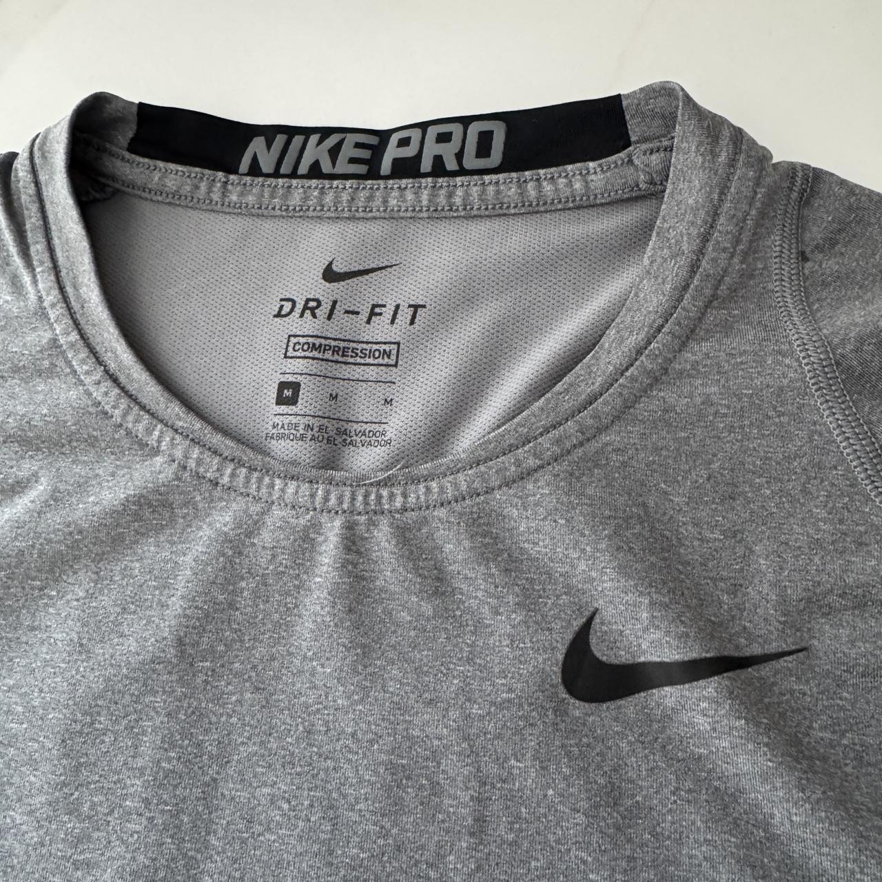 Grey Nike Pro Dri-Fit compression t-shirt in size M... | Depop
