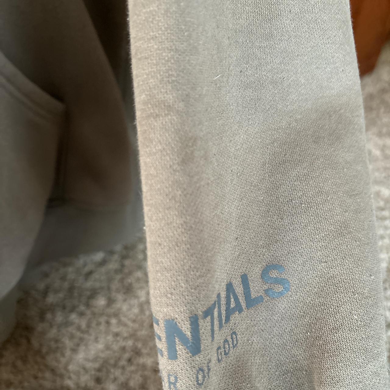 olive green Essentials hoodie, a couple of small... - Depop