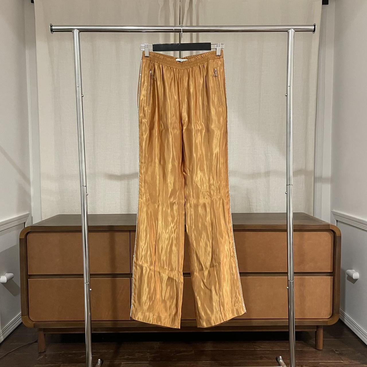 area liquid metal pants with signature crystals on... - Depop