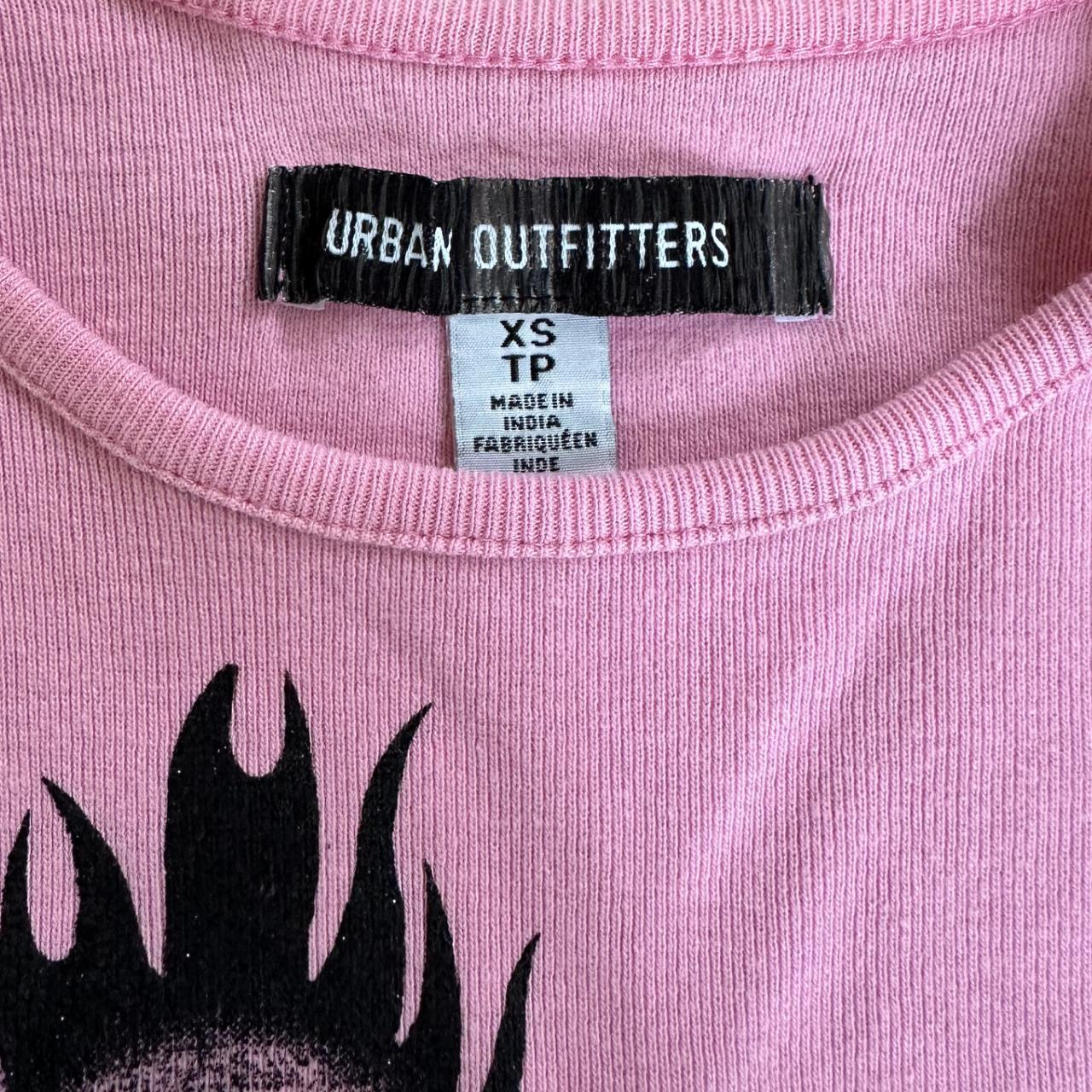 Pink Urban Outfitters "Beat It" baby tee | Depop