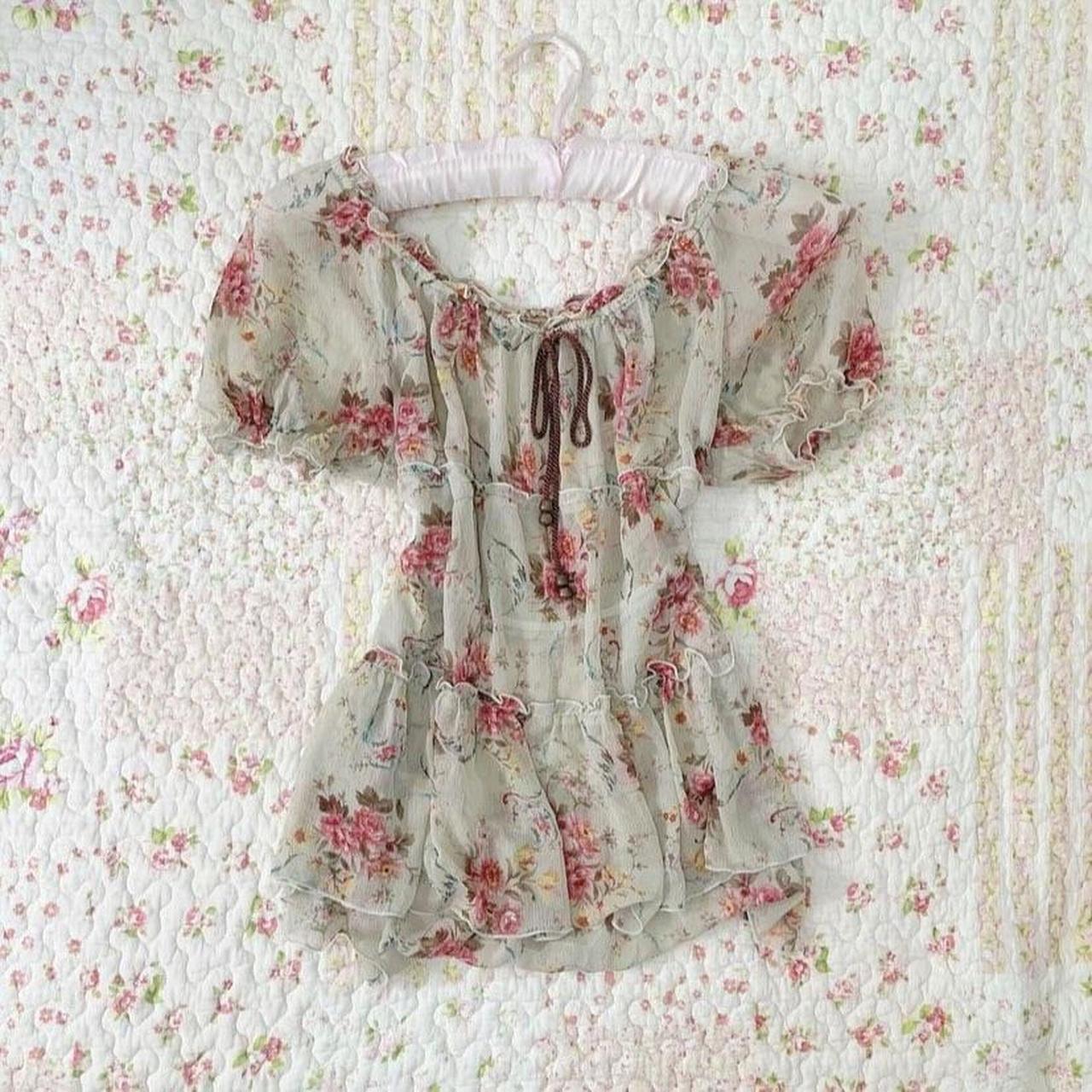 pretty floral top with brown draw strings S/M... - Depop