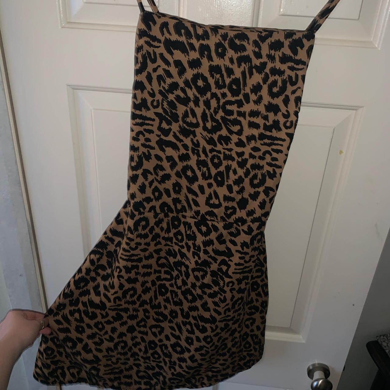 Super cute leopard print short dress with a 2 tie back! - Depop