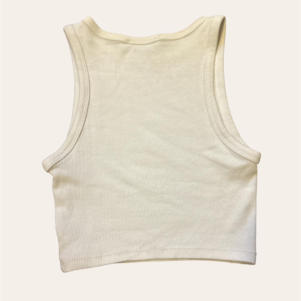 white cropped wife beater some discoloration on the... - Depop