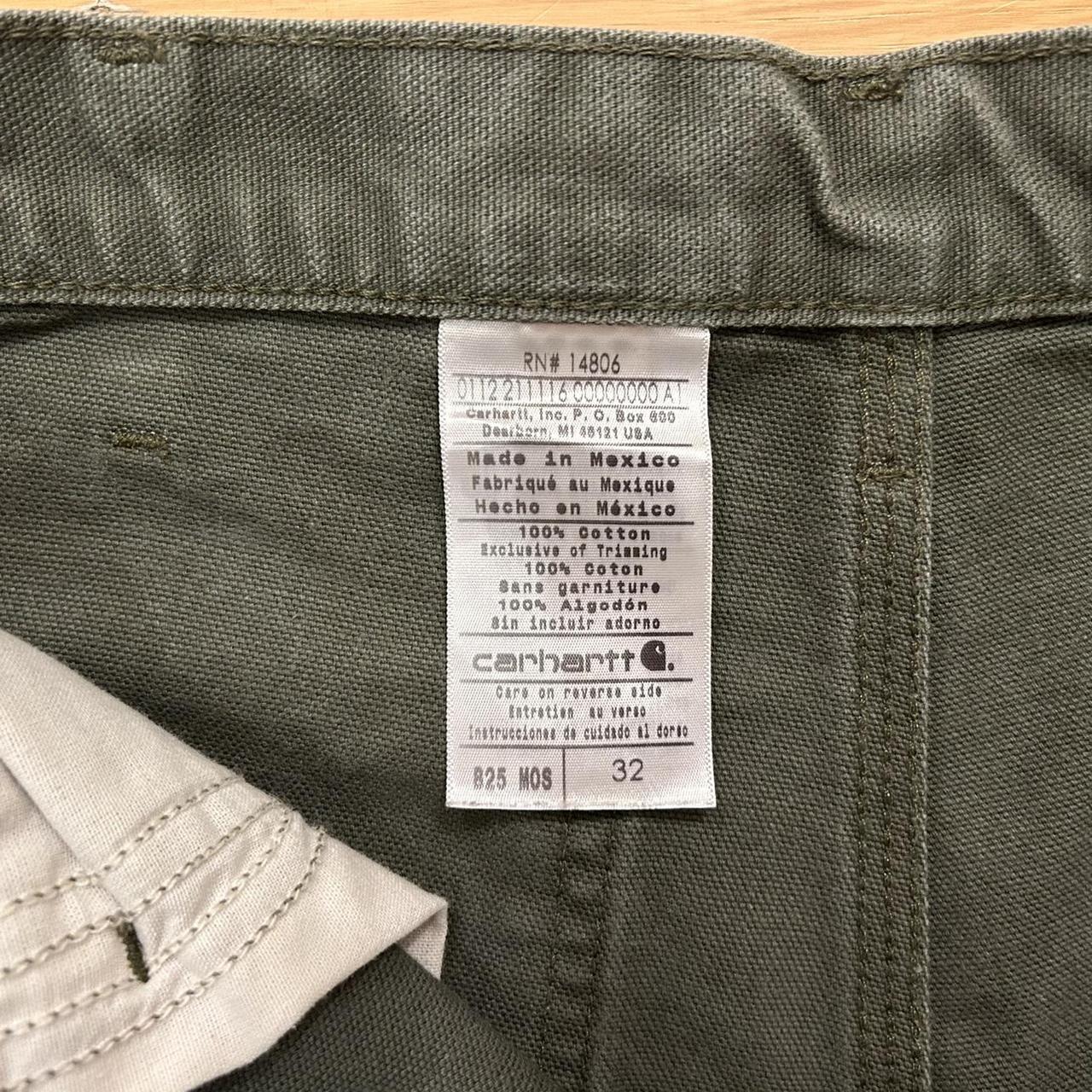 carhartt carpenter shorts in olive green size... - Depop