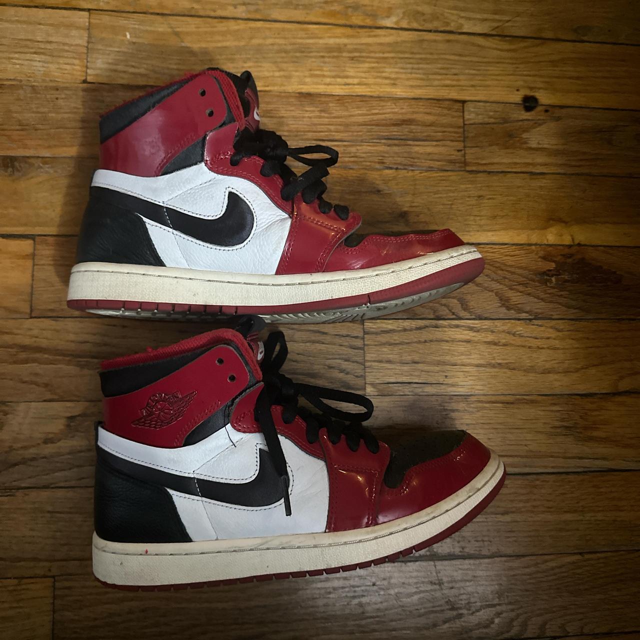 Jordan 1s red black and white women - Depop