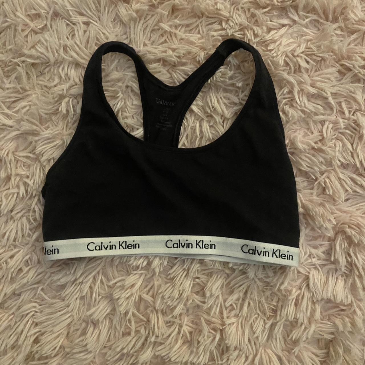Calvin Klein black sports bra Labeled as small but... - Depop