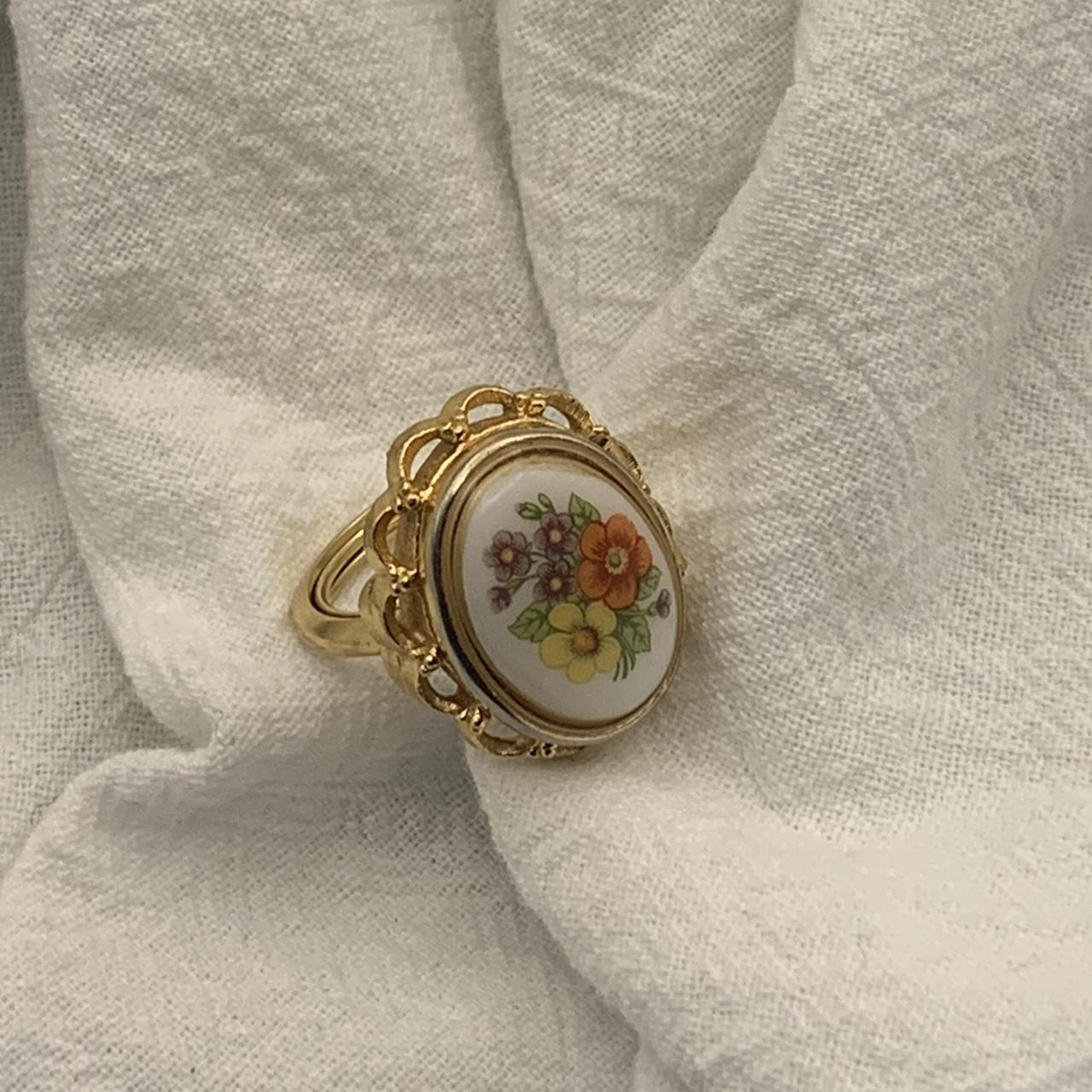 Avon floral adjustable ring Poison secret... - Depop