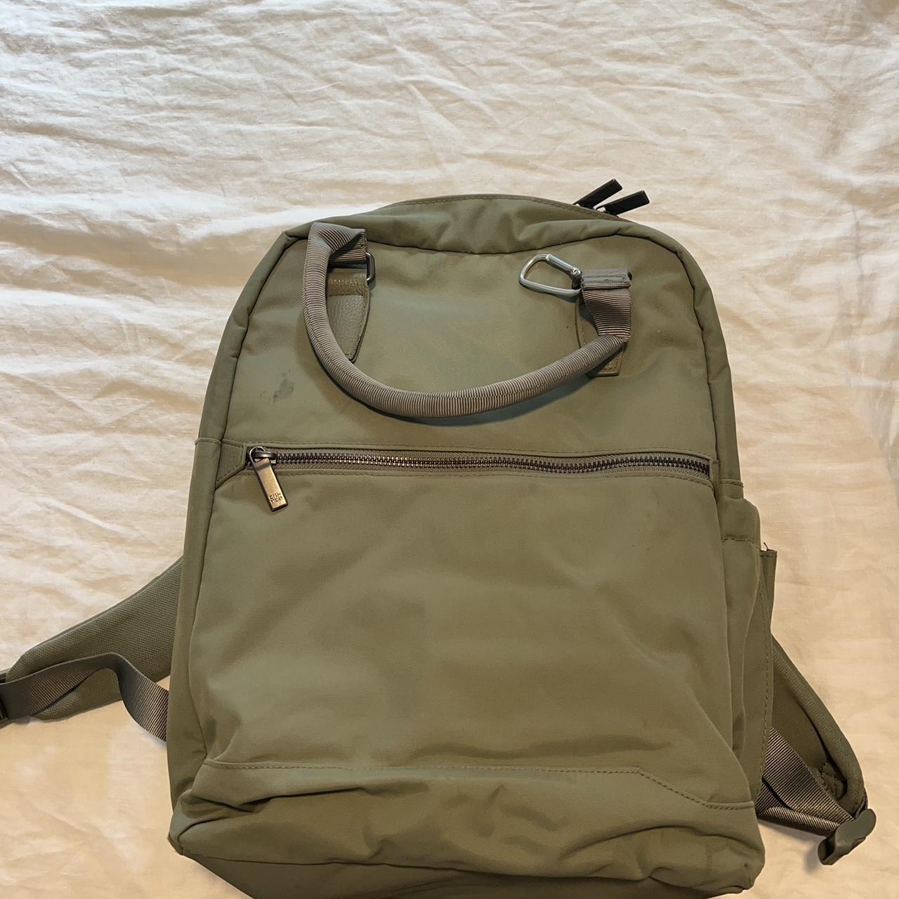 Green commuter backpack with front pocket, water... - Depop