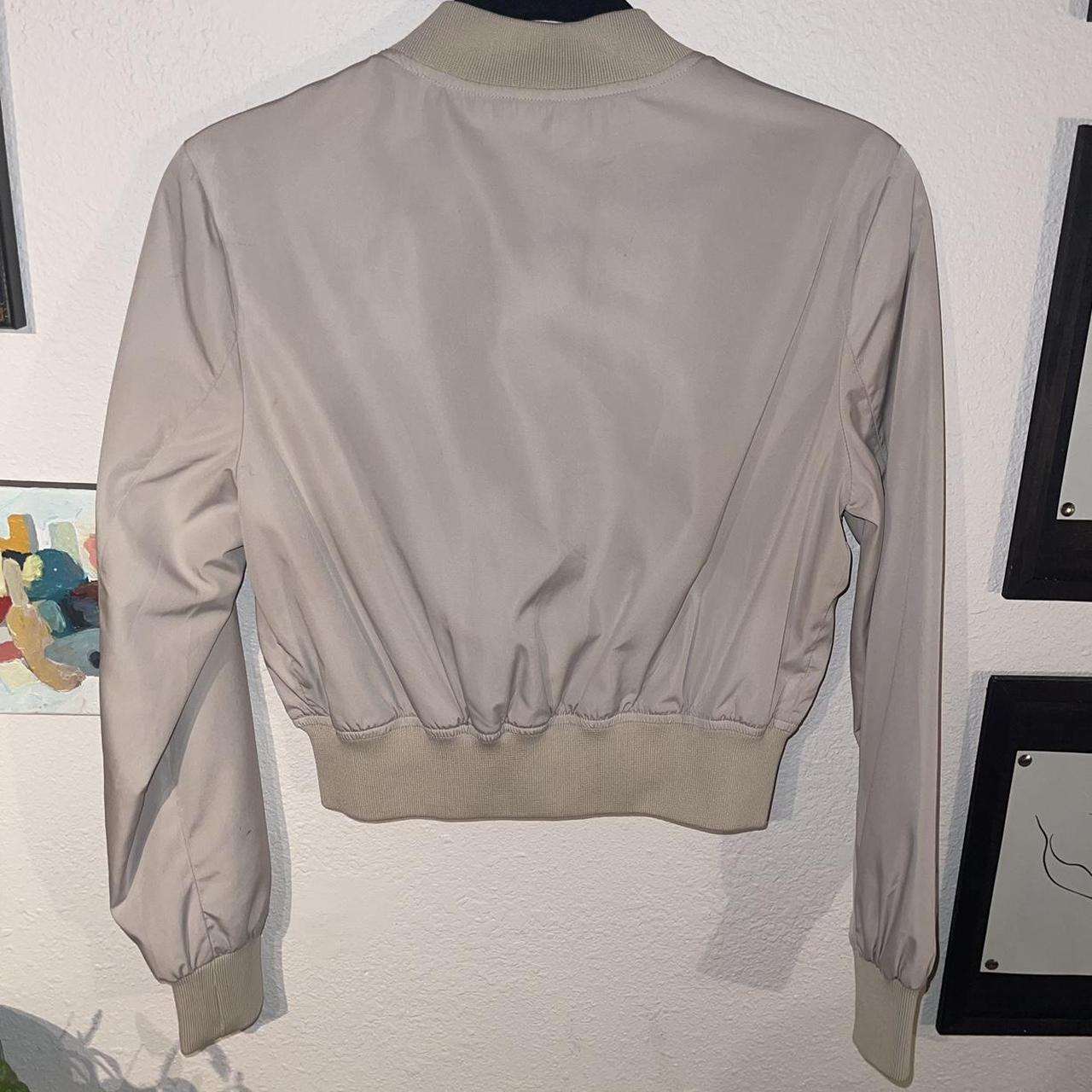 Cream bomber jacket. Cropped fit with silver... - Depop