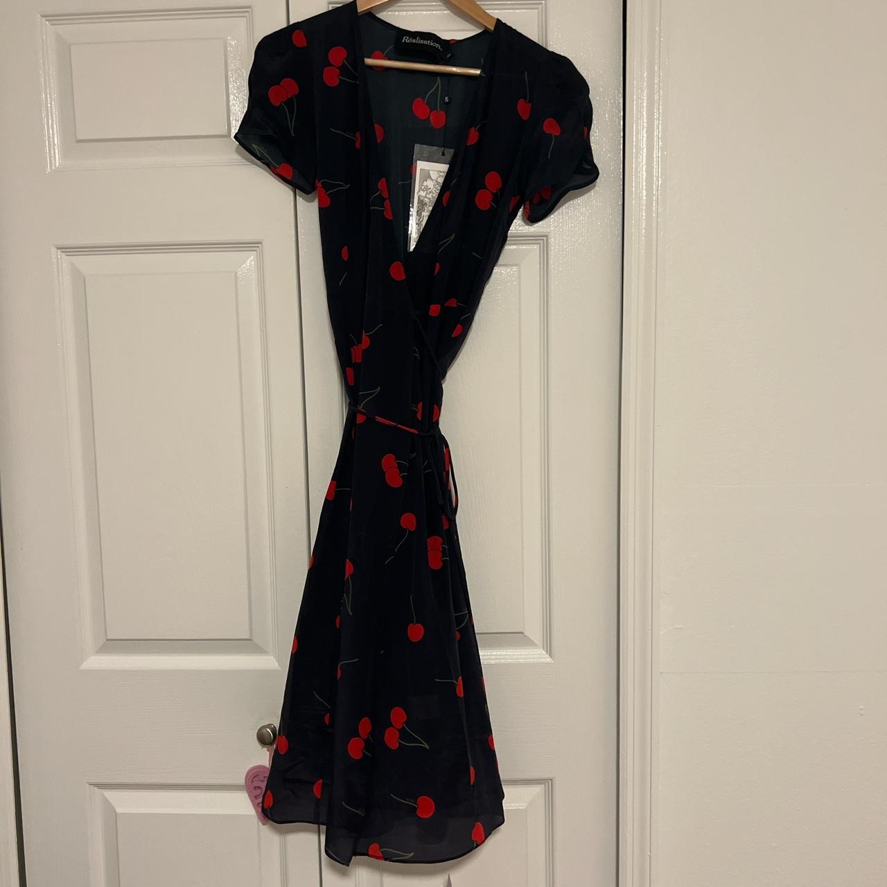 NWT realisation par teale wrap dress in wild... - Depop