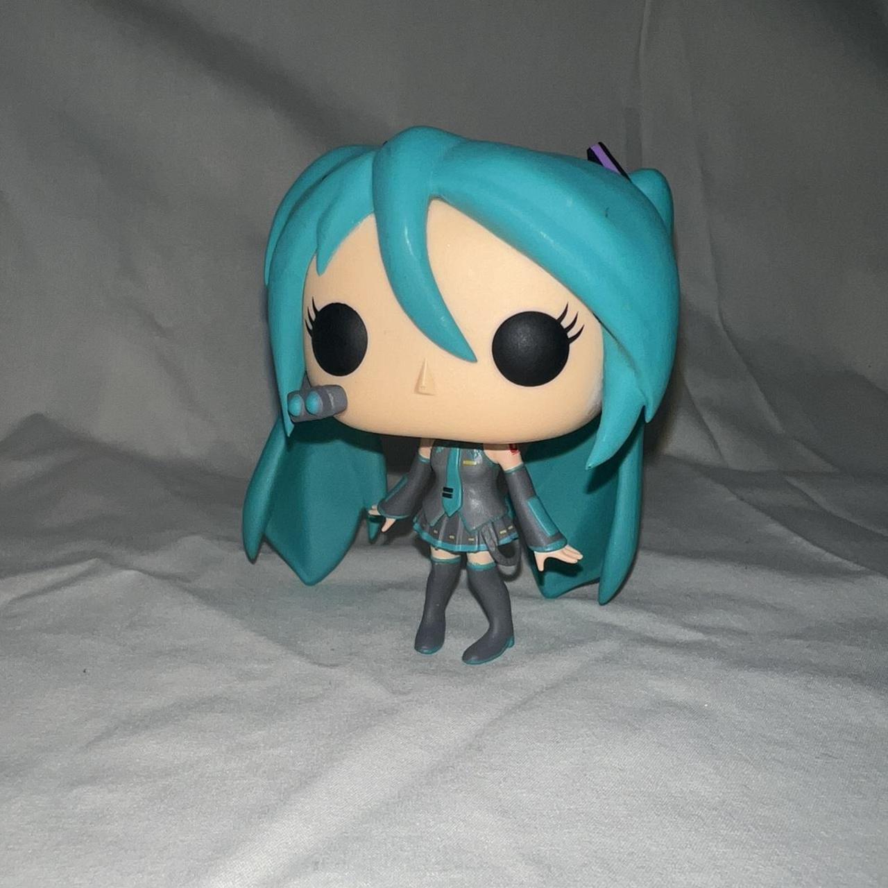 Original crypton Miku funko- has a few scuffs on her... - Depop