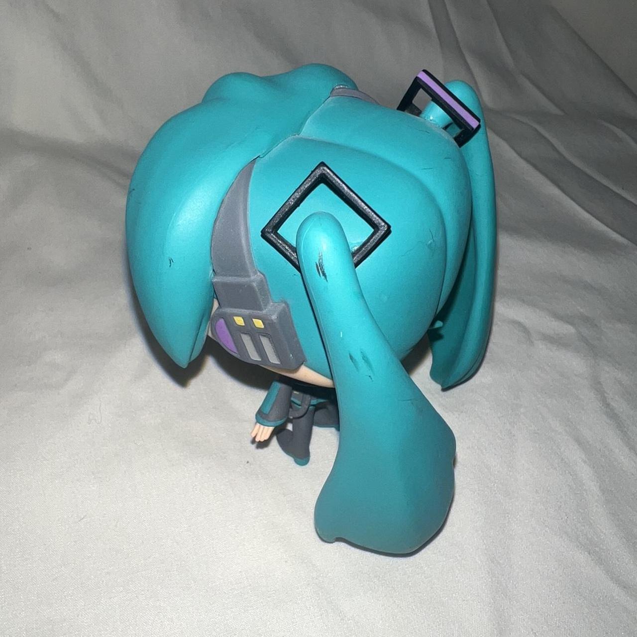 Original crypton Miku funko- has a few scuffs on her... - Depop