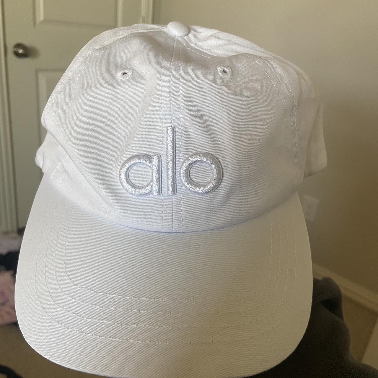 Alo hat, bright white, never worn out, was gifted... - Depop