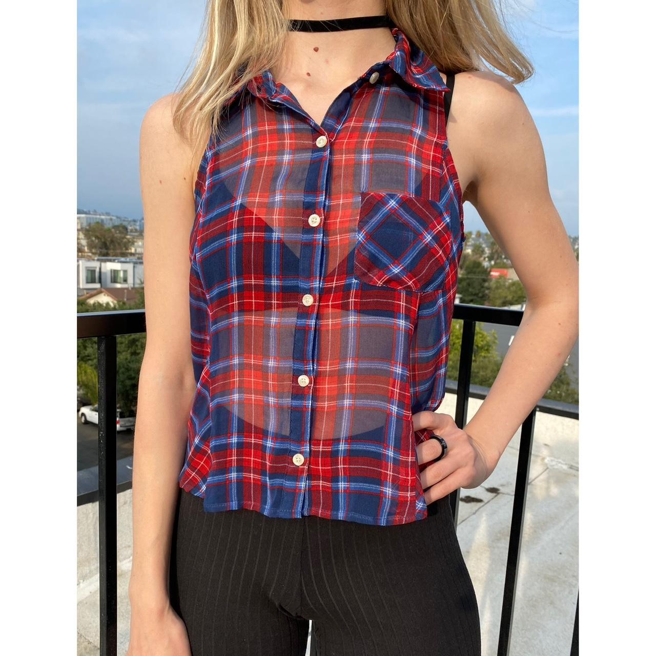 This red and blue plaid sleeveless top is slightly... - Depop