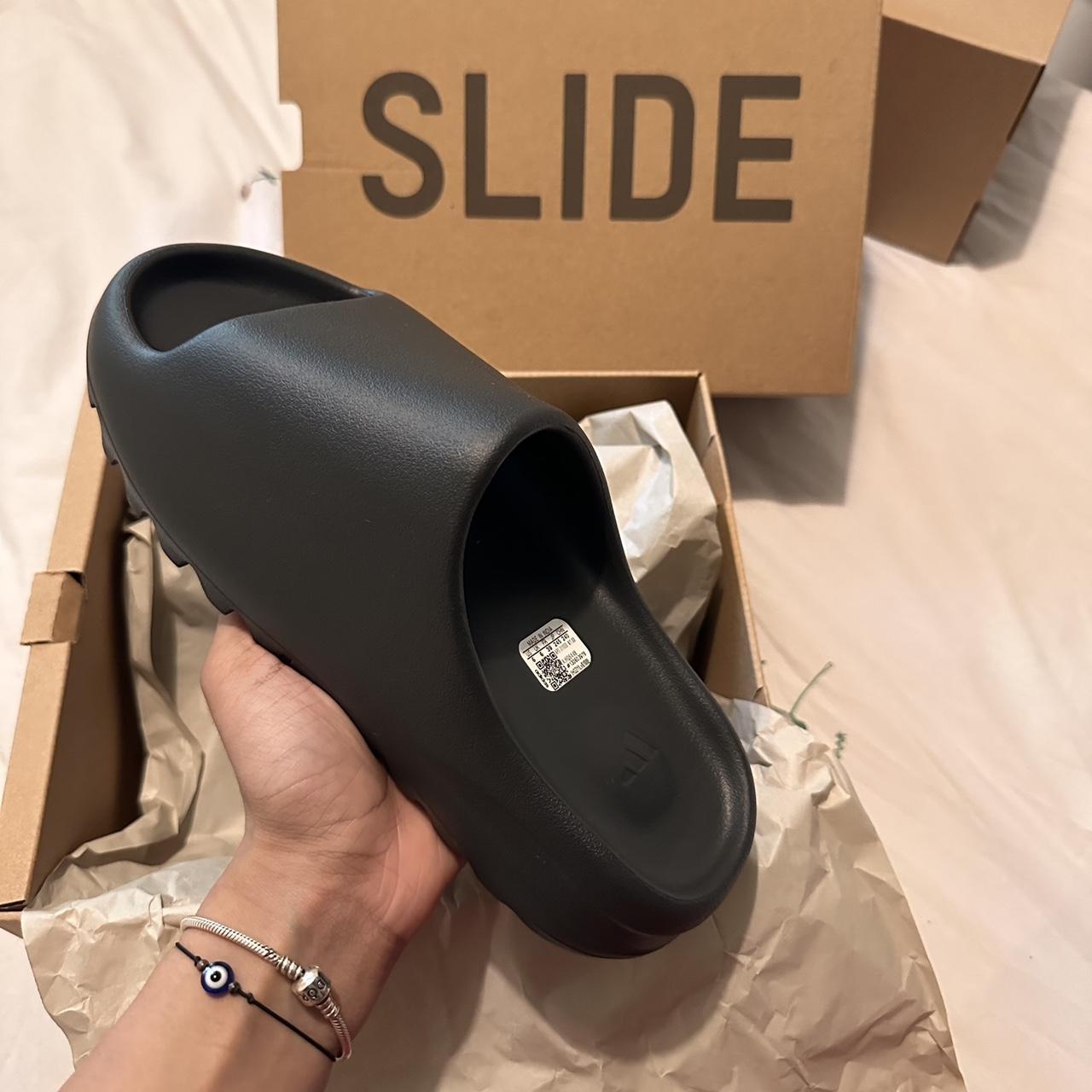 Brand New Yeezy Slide Onyx Fresh in the box Size 6... - Depop