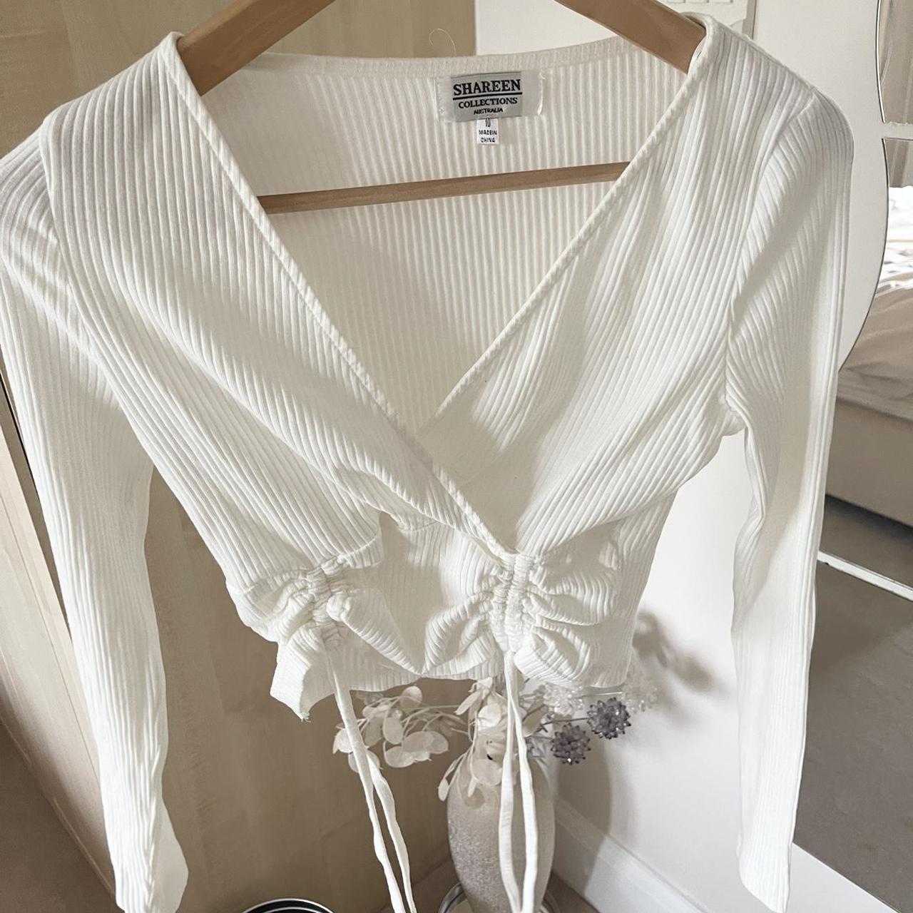 Cream/off white ribbed crop long sleeve top with... - Depop