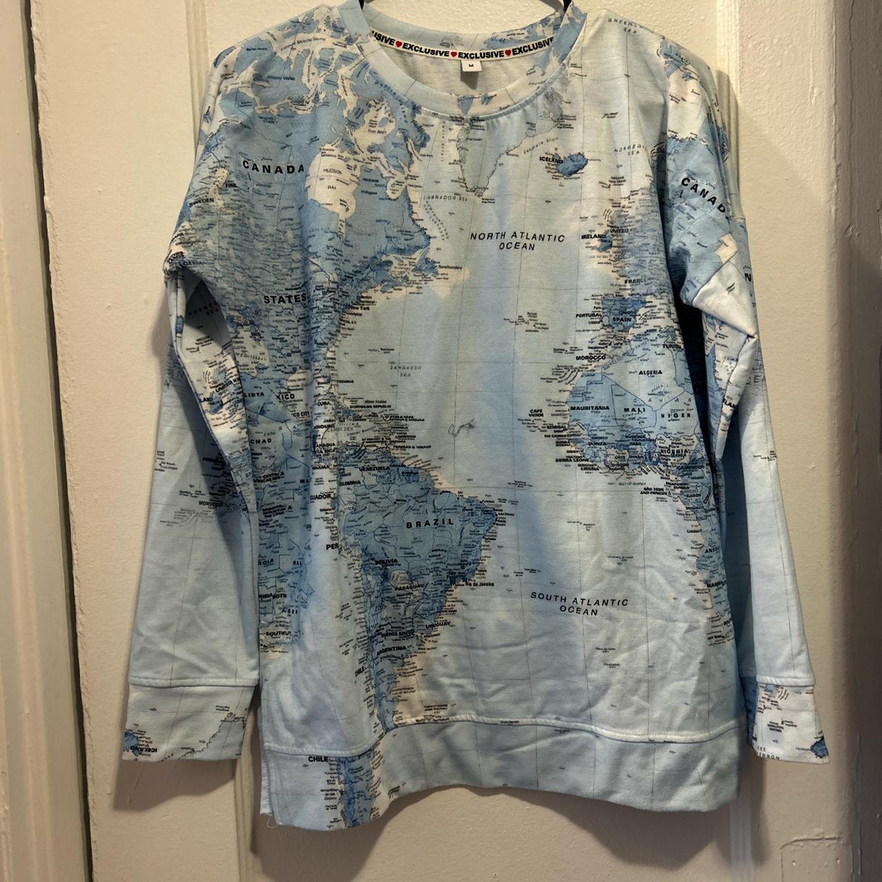 Blue and white World Map long sleeve light... | Depop