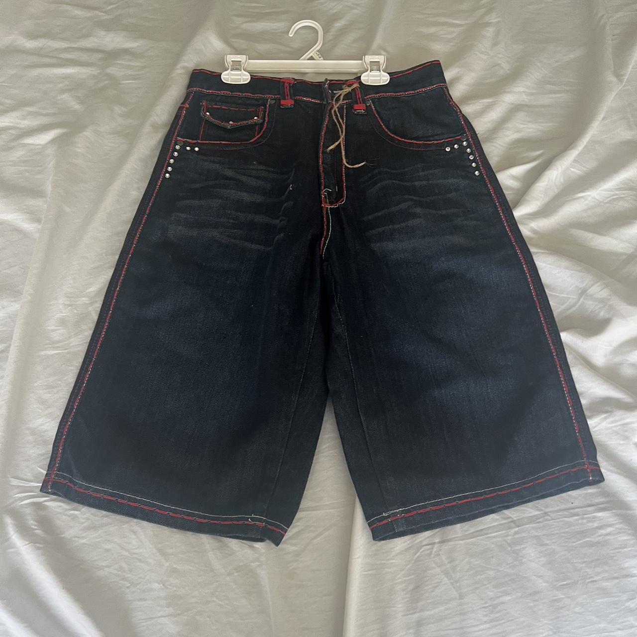 Dark blue jorts with graphic on back (size 30x?) - Depop