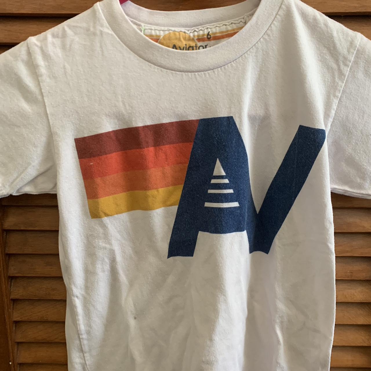 Aviator nation shirt! Kids size 6, very small stain... - Depop