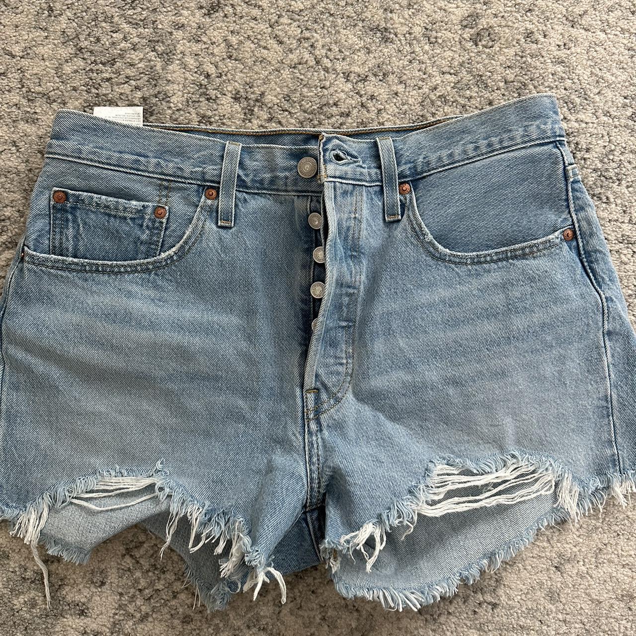 Levi's shorts barely worn. I'm not 100% sure what... - Depop