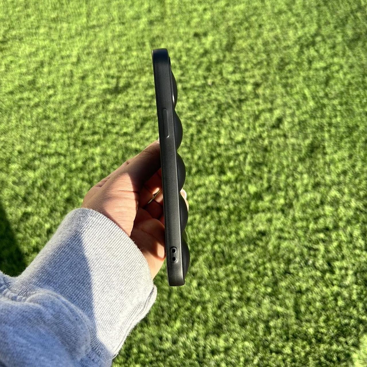 The North Face phone case fits an IPhone 12 super... - Depop