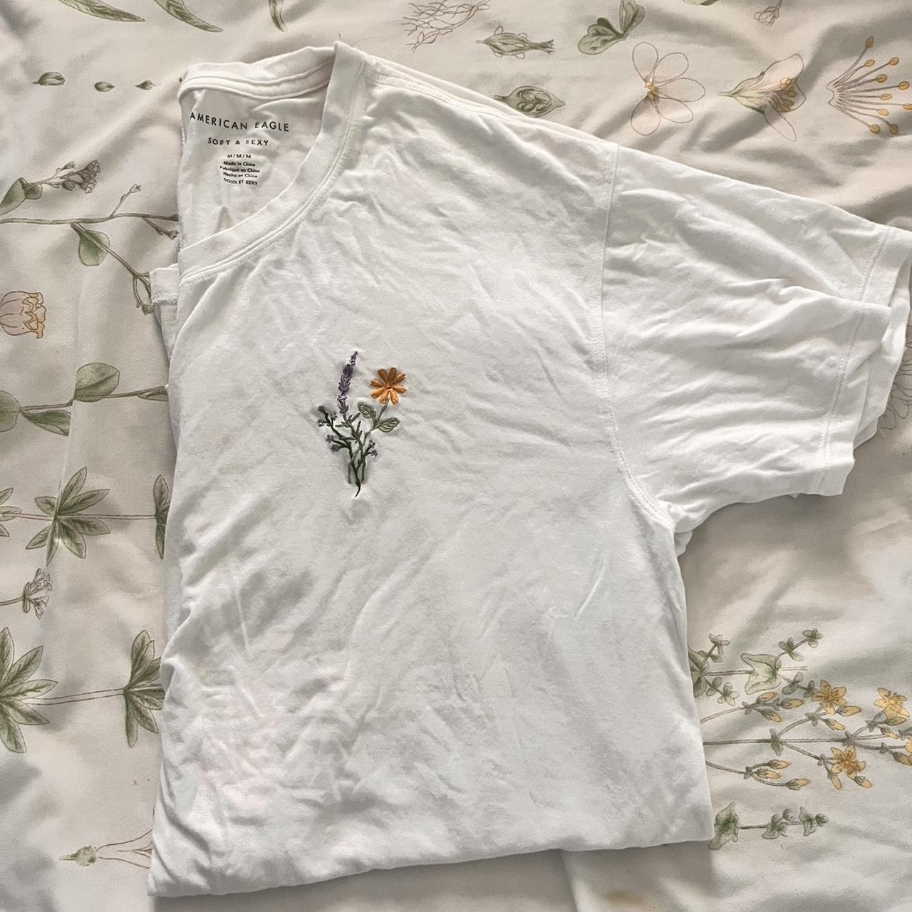 american eagle white t shirt w embroidery size... - Depop