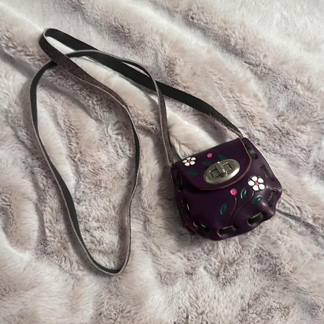 Tiny/ mini purse. Long strap. It’s fully leather... - Depop