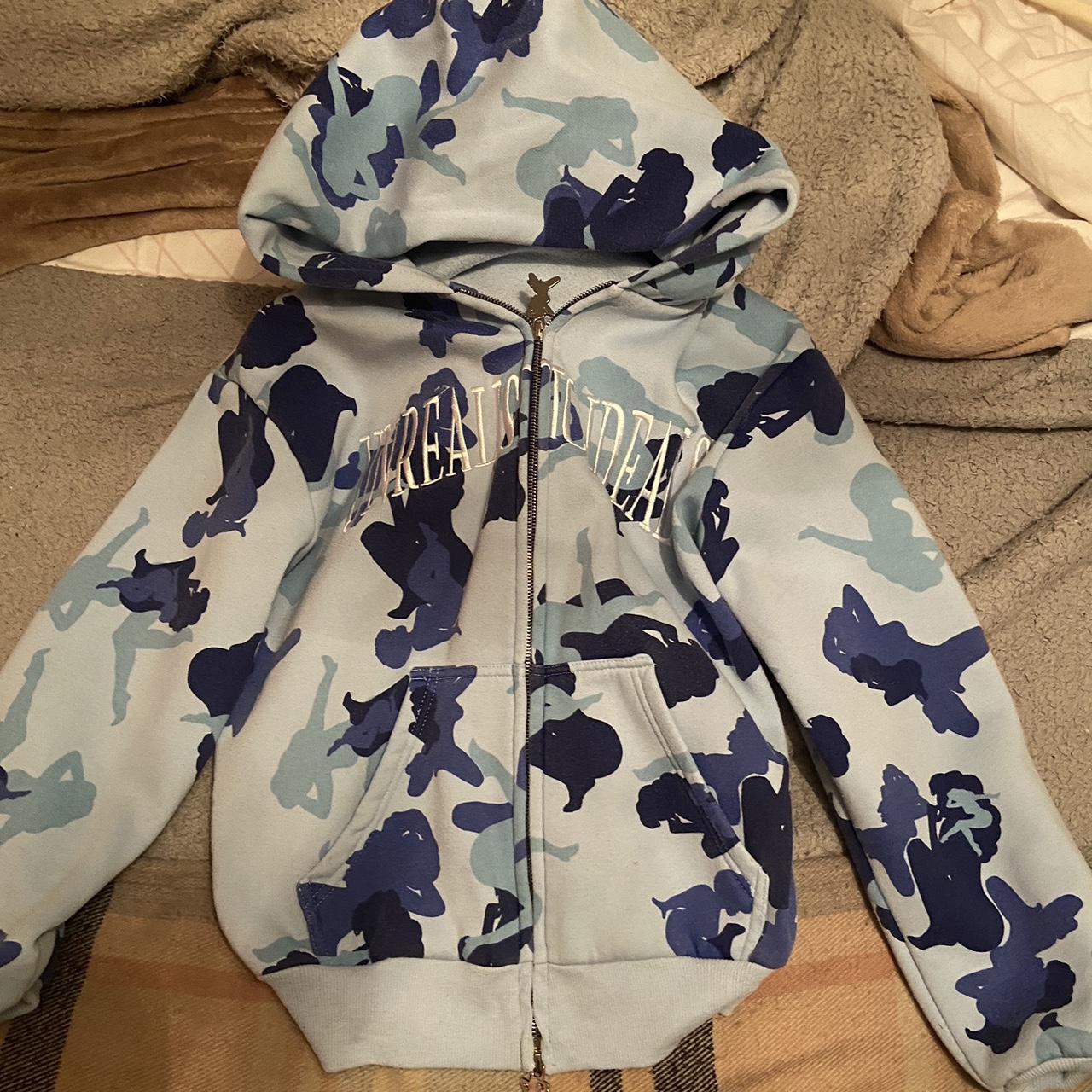 Blue named collective hoodie- slightly bobbled after... - Depop