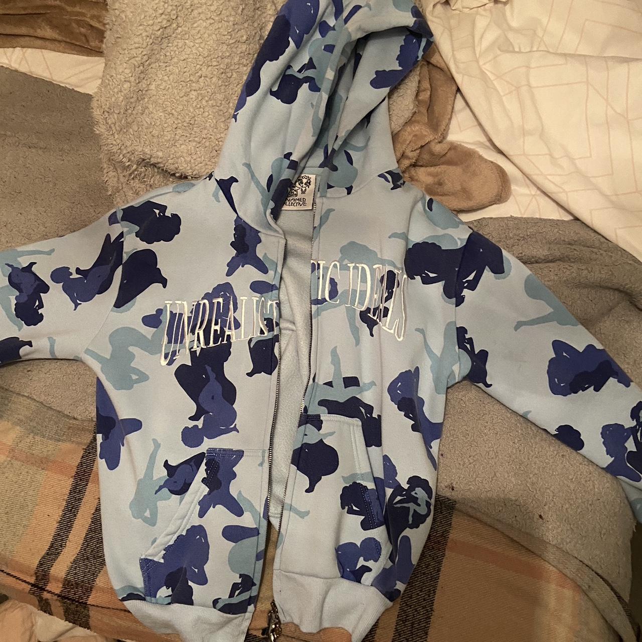 Blue named collective hoodie- slightly bobbled after... - Depop