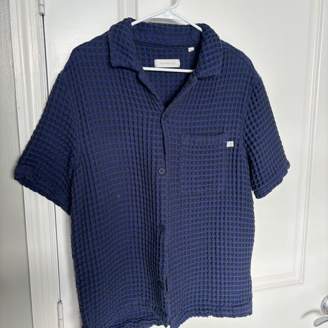 Blue short sleeve button up. Pretty neat texture - Depop