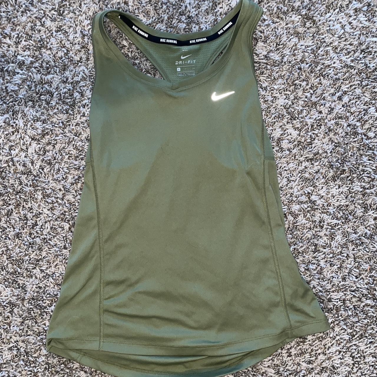 Green Nike tank with razor back No signs of wear... | Depop