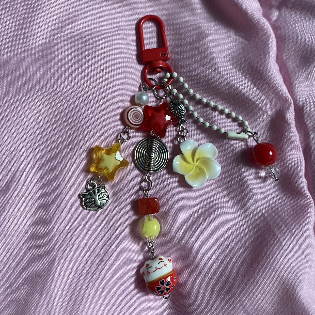 red and yellow lucky cat handmade... - Depop