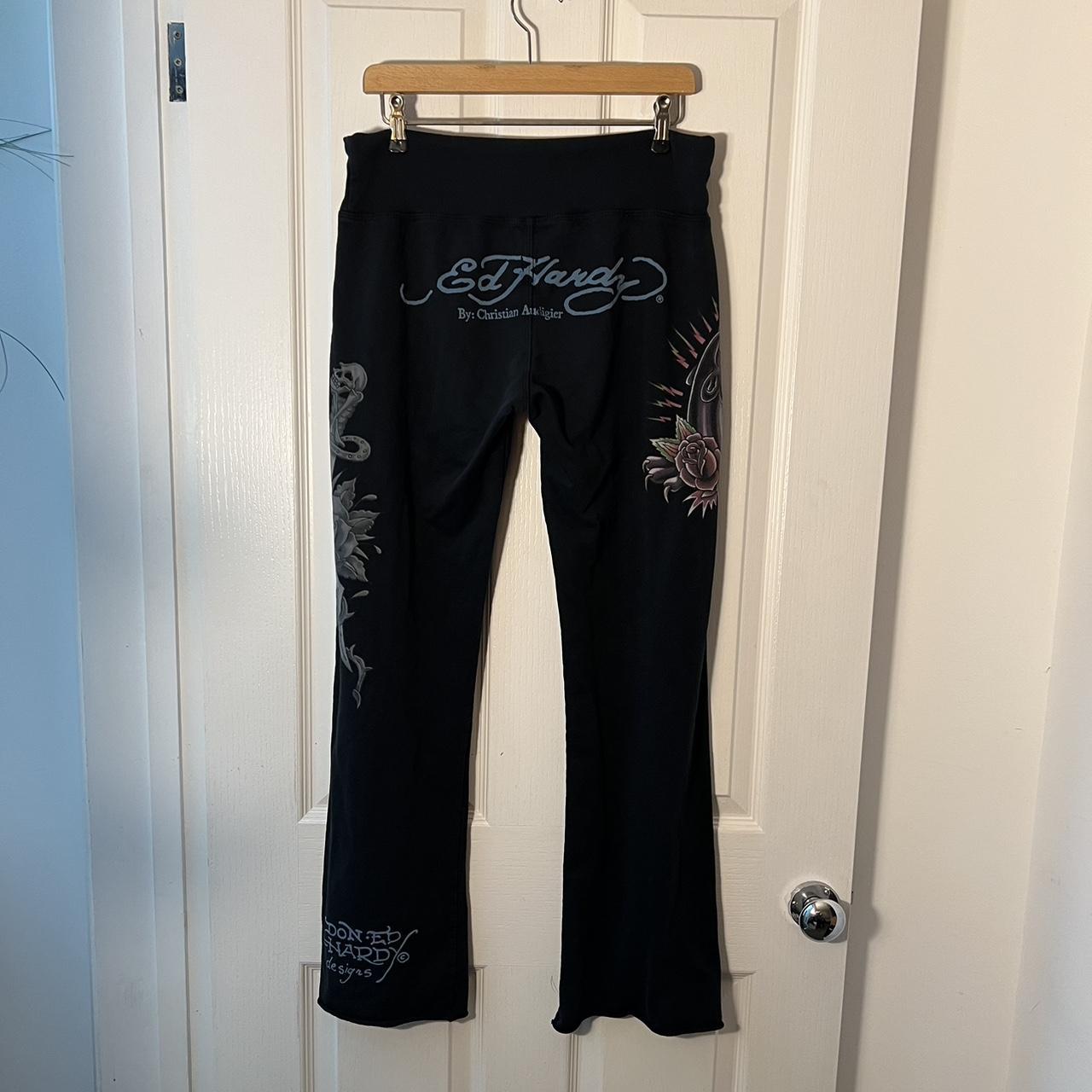 Ed Hardy flared bottoms with ‘Ed Hardy’ writing on... - Depop