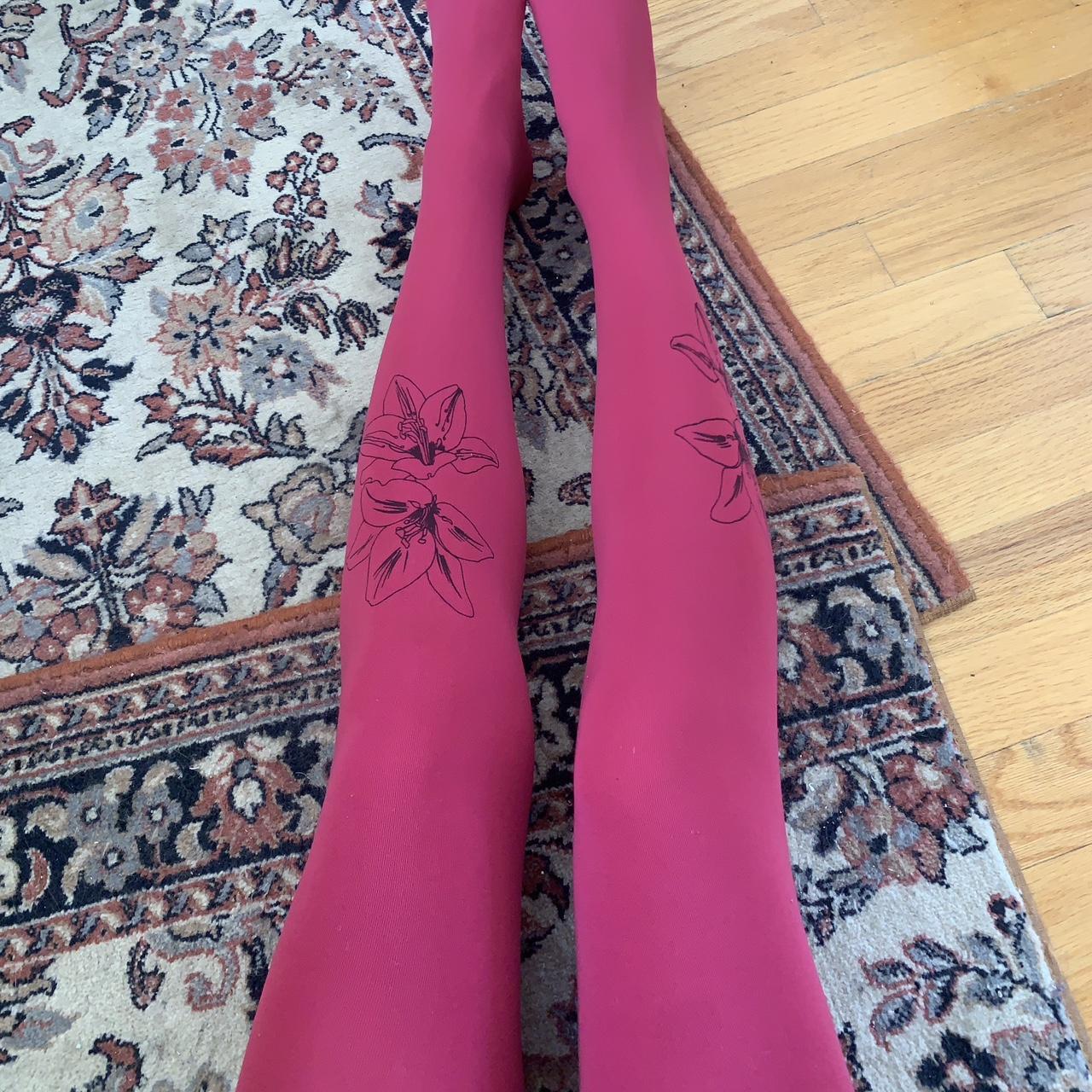 Thick pink patterned tights with black flower on... - Depop
