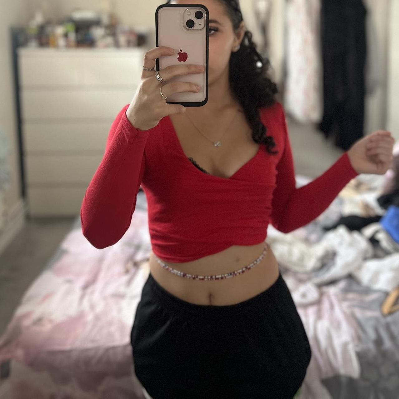 very cute red top. worn it 3-4 times and is still in... - Depop