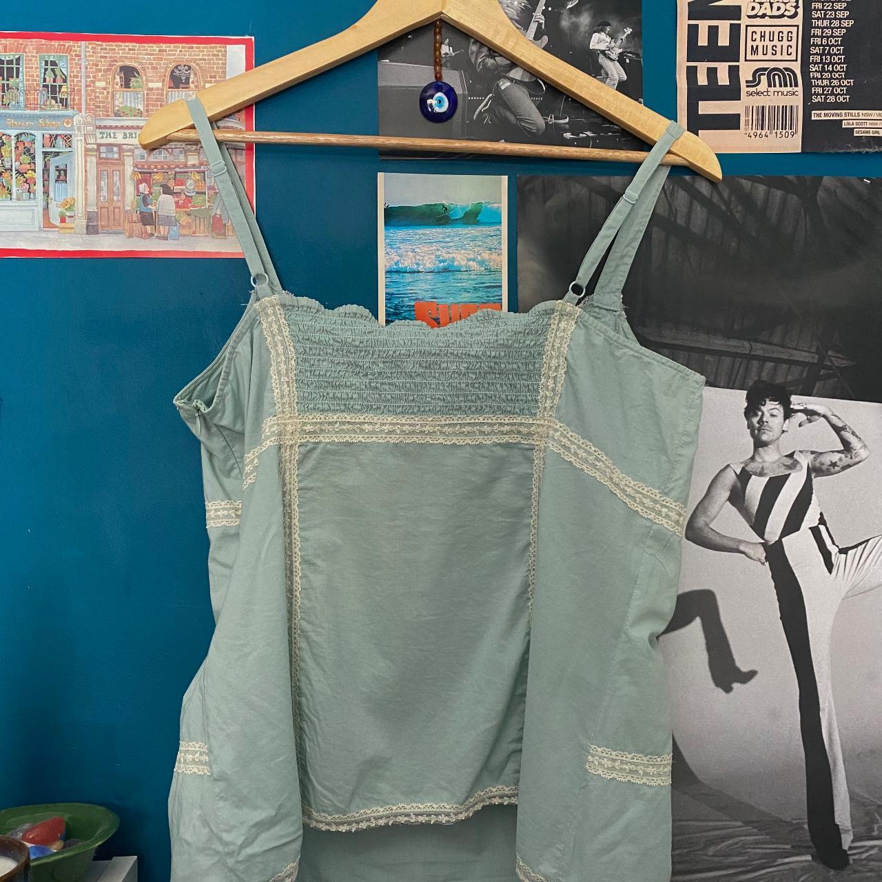 Prettiest light turquoise singlet, has lacy... - Depop