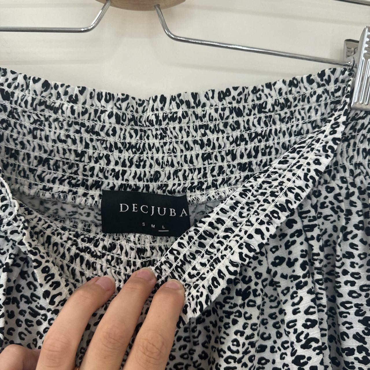 Decjuba Black and white animal print skirt. Size L - Depop