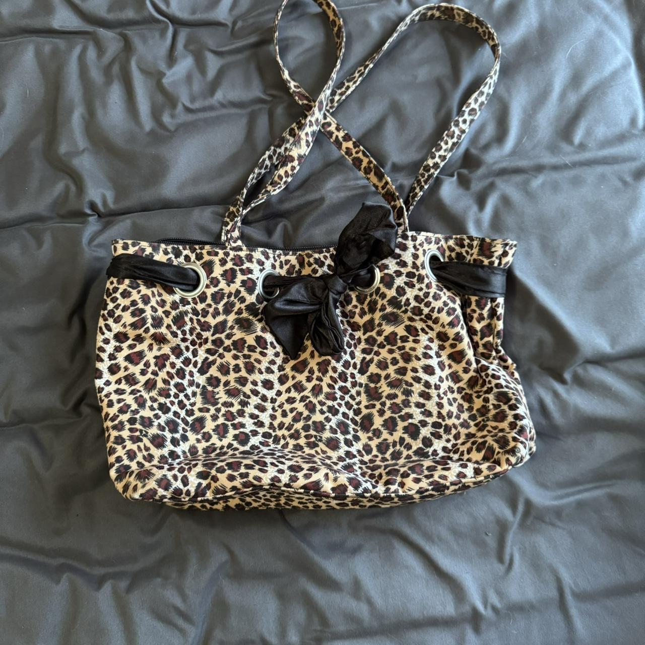 Cheetah print purse with black bow cute... - Depop