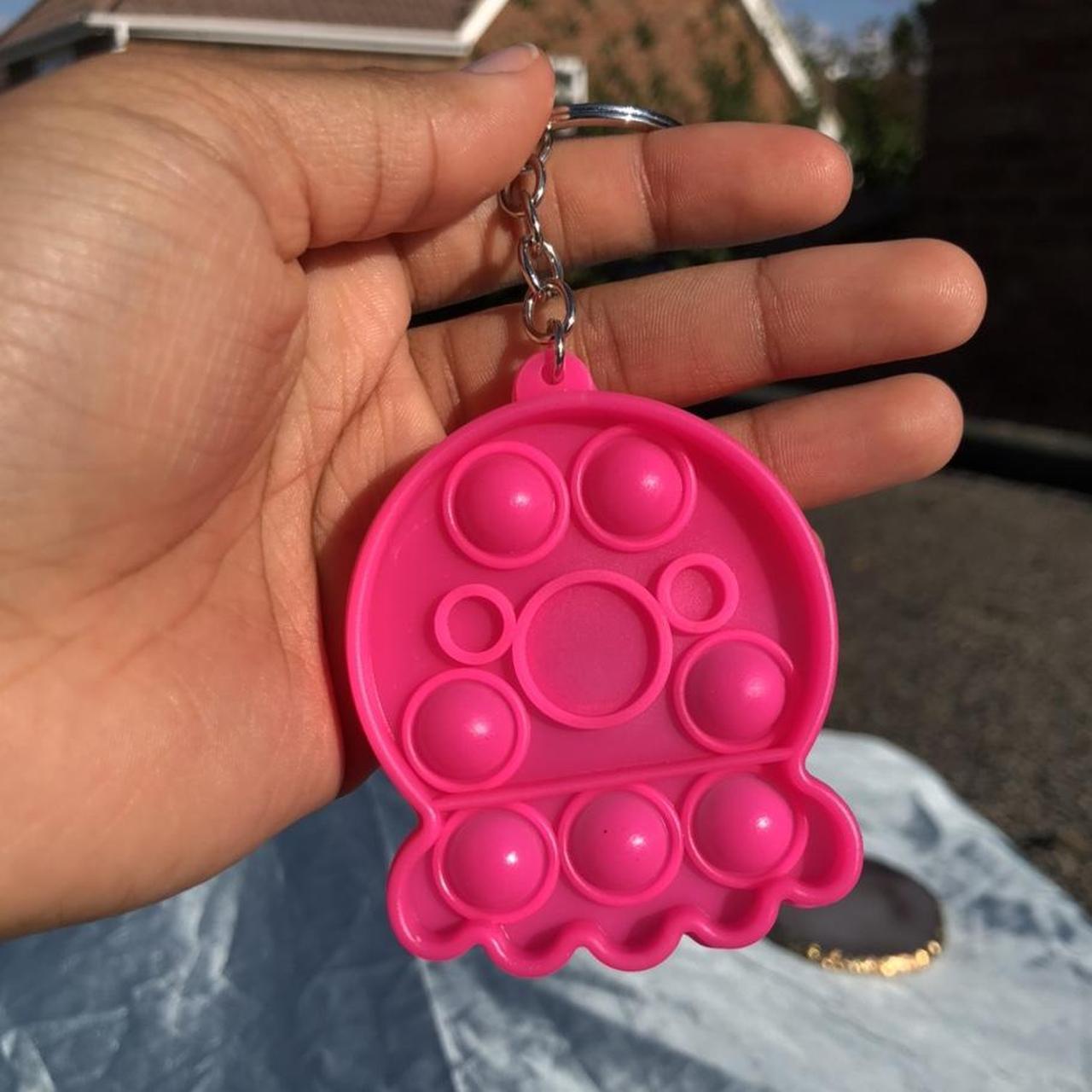 Pink octopus pop it keychain FREE SHIPPING... - Depop